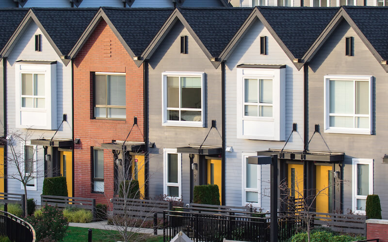 What Is a Townhouse? 7 Pros & Cons of Townhome Living